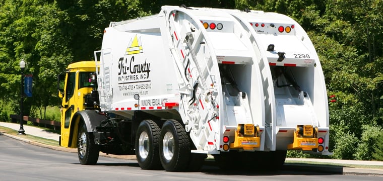 McNeilus Rear Loader Garbage Trucks | Split Body