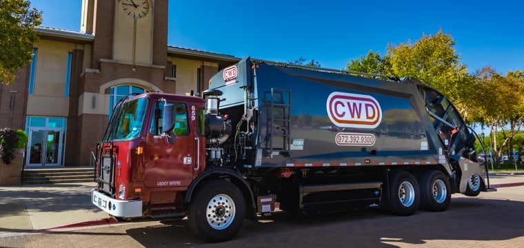 McNeilus Rear Loader Garbage Trucks | Tag Axle