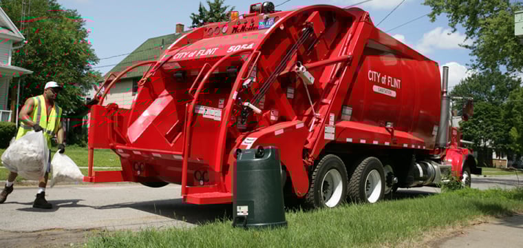 McNeilus Rear Loader Garbage Trucks | Tag Axle